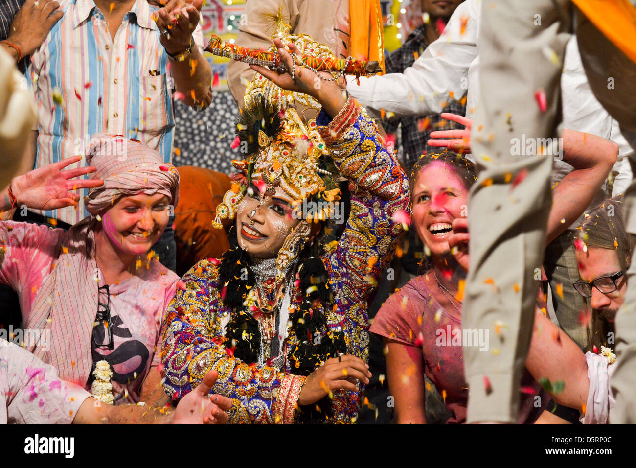 foreigner with indian people dancing on the floor at holi gate Stock ...