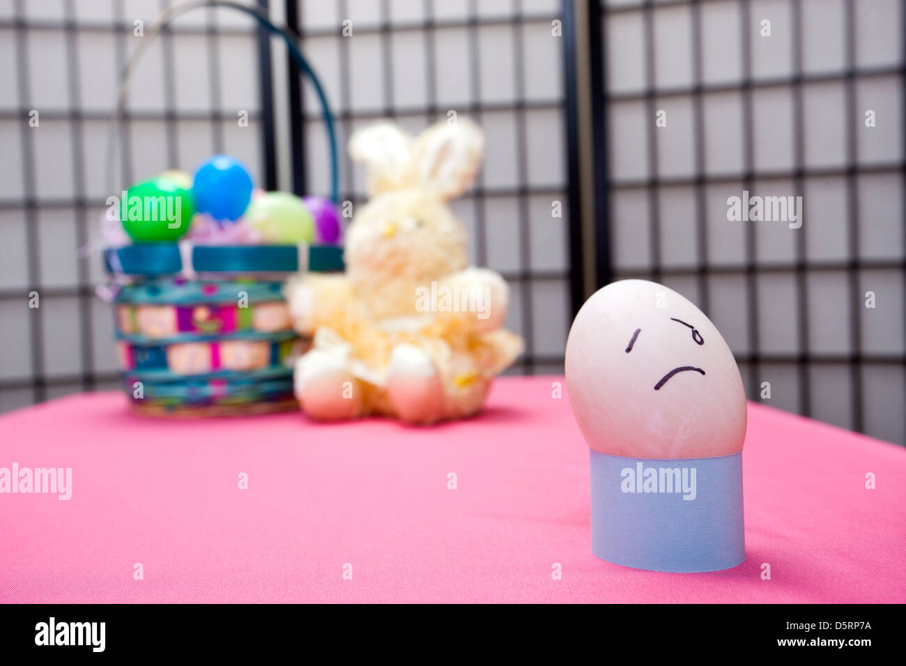 Egg with sad face Stock Photo - Alamy