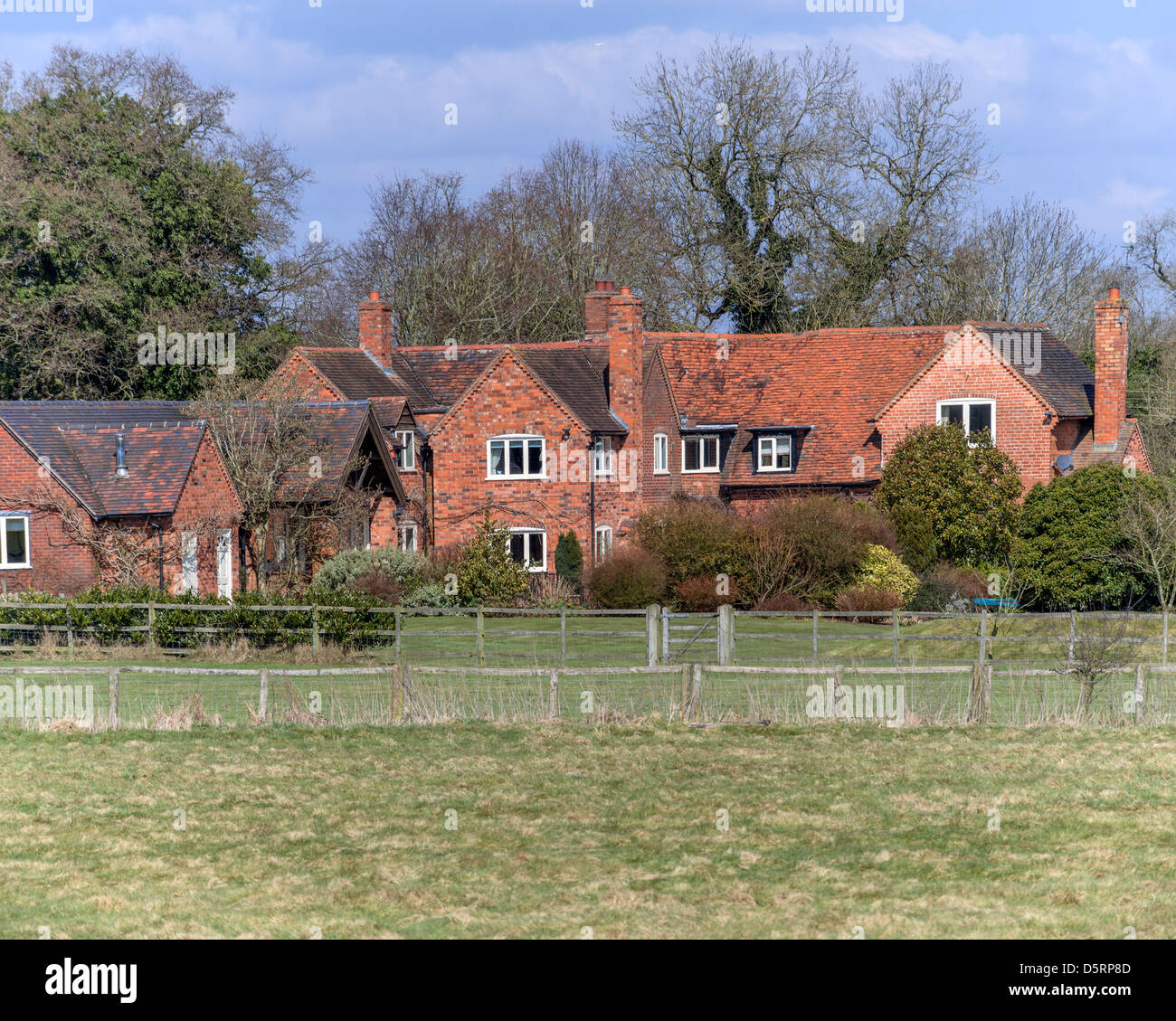 a large farmhouse in the countryside Stock Photo - Alamy