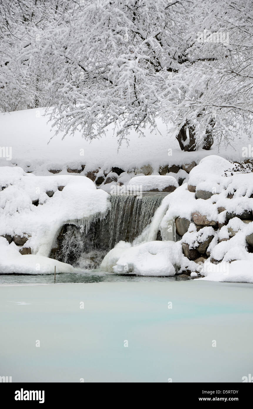 Snow covered waterfall Stock Photo - Alamy