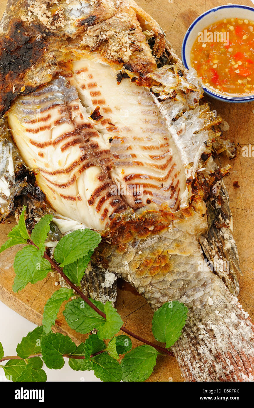 Grilled fish with salt Stock Photo - Alamy