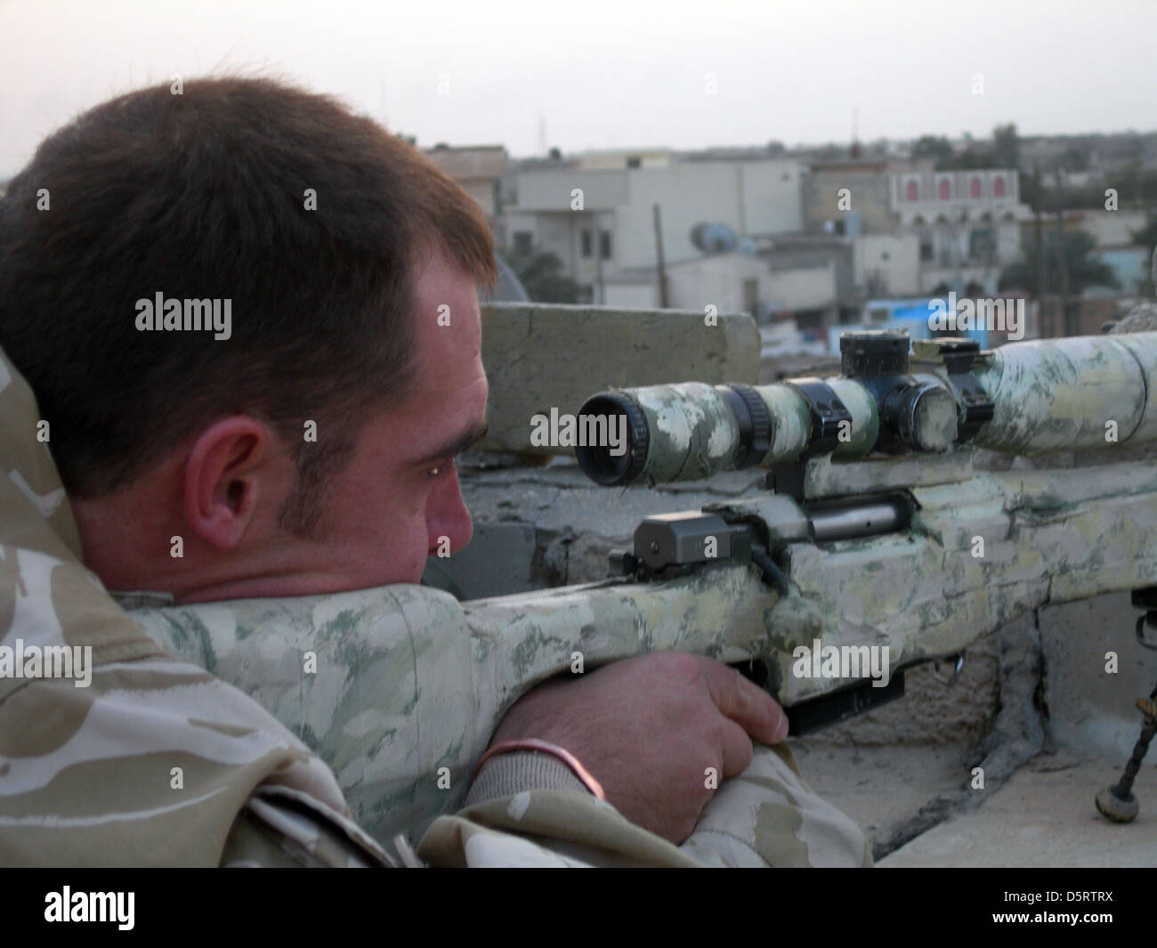 a British sniper on the roof tops in Iraq Stock Photo - Alamy