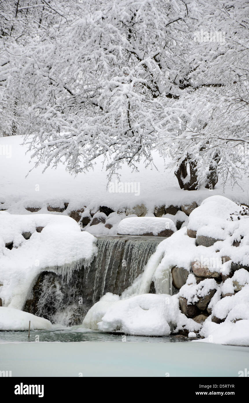 Snow covered waterfall Stock Photo - Alamy