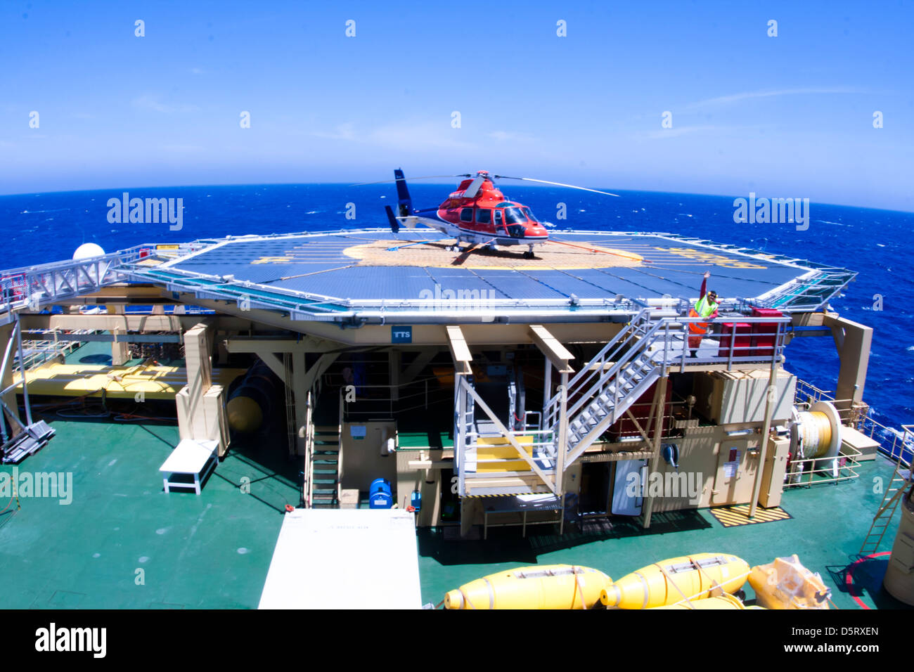 helicopter landed in the landing deck of seismic vessel Ramform ...