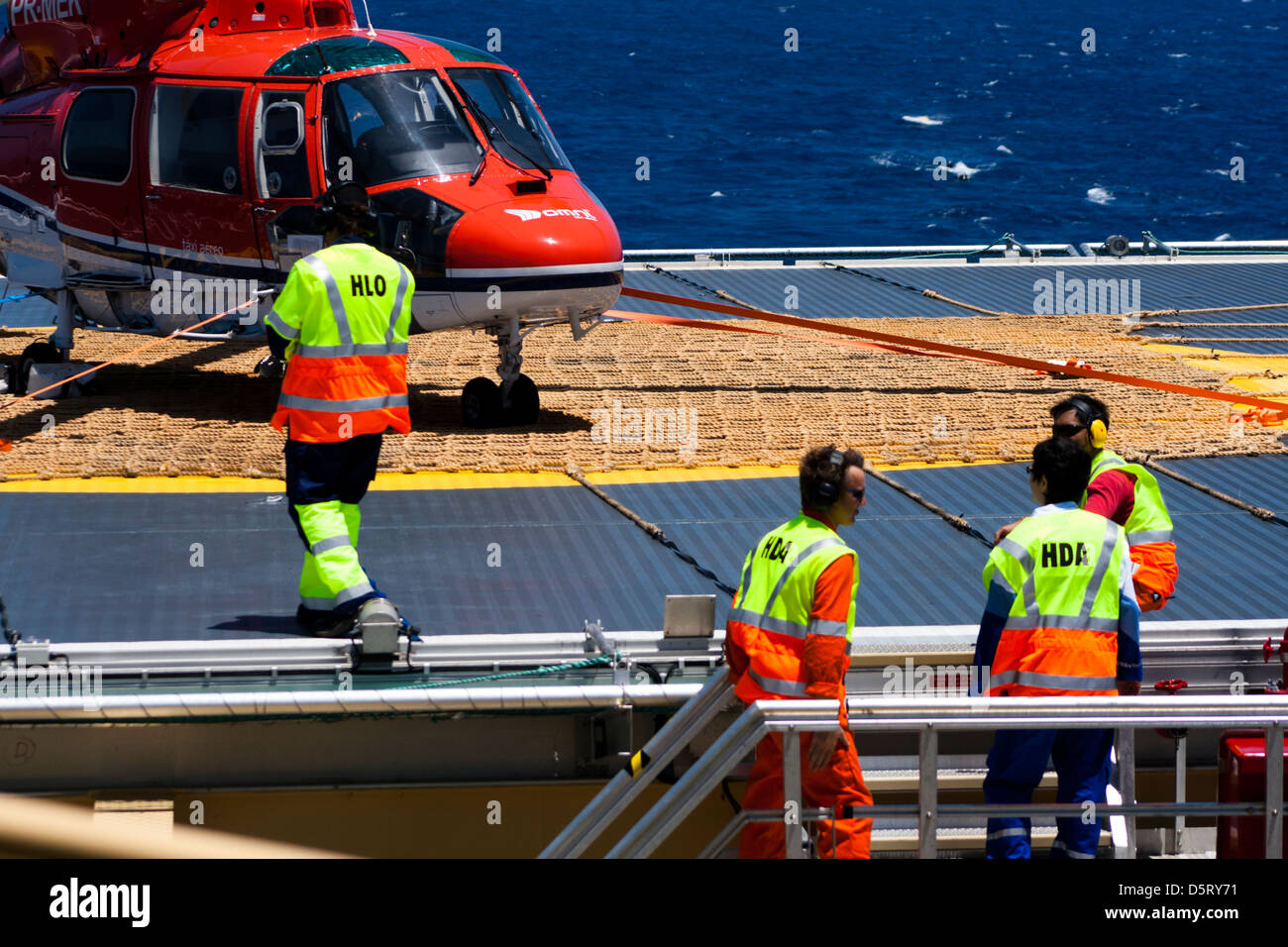 helicopter landed in the landing deck of seismic vessel Ramform ...