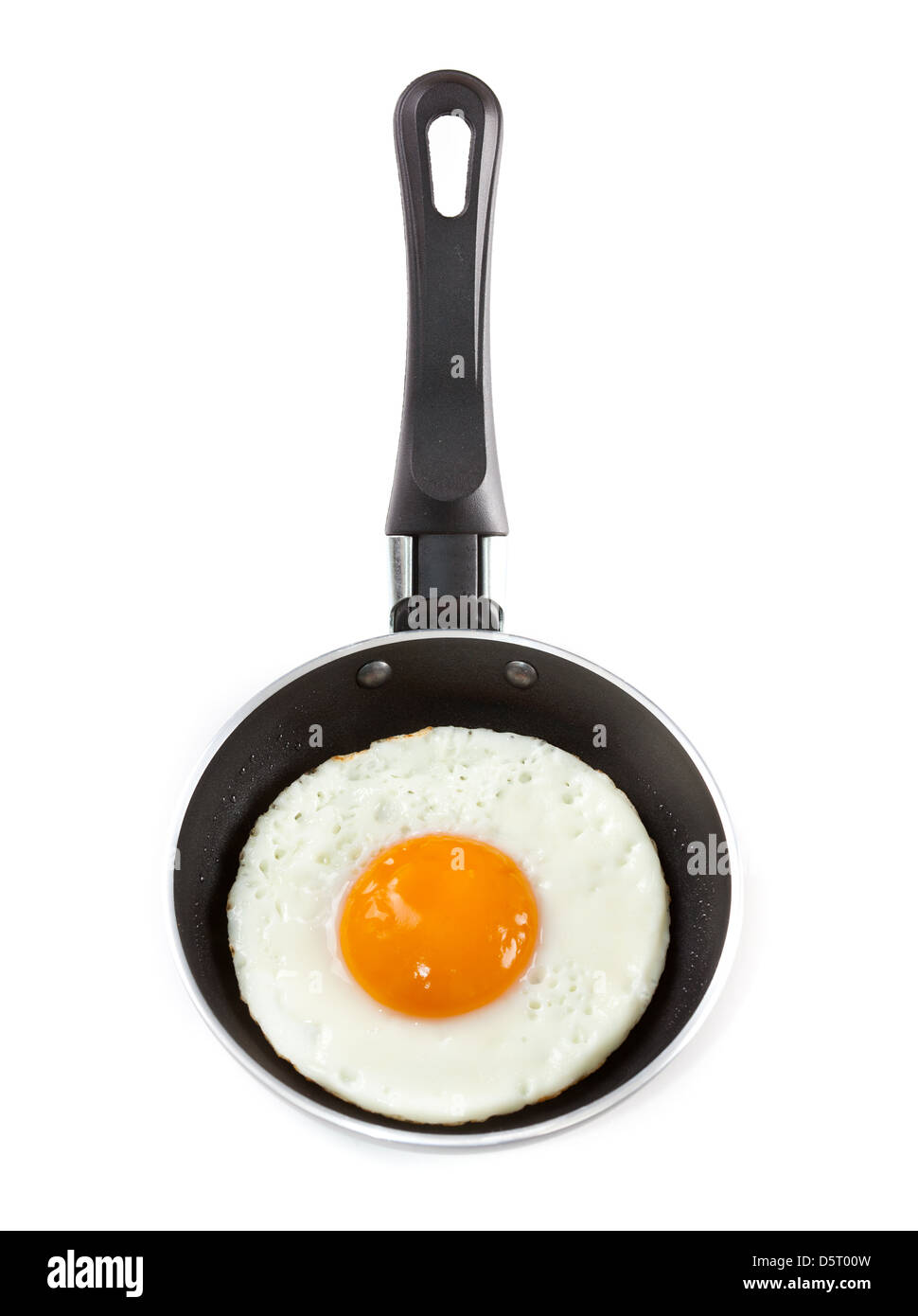Cooking egg in pan cooking Cut Out Stock Images & Pictures - Alamy