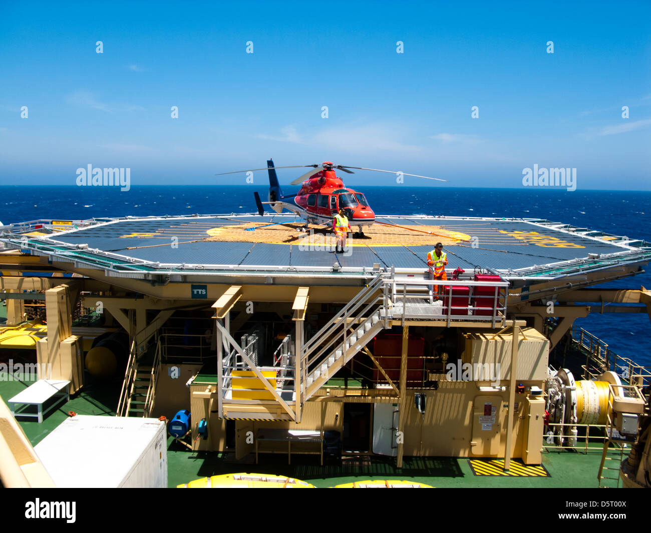 helicopter landed in the landing deck of seismic vessel Ramform ...