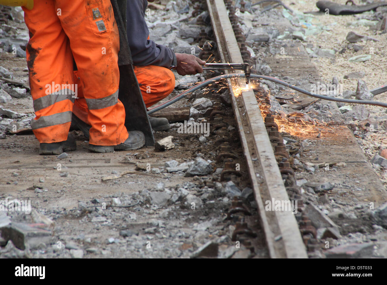 Men cutting sleepers hi-res stock photography and images - Alamy