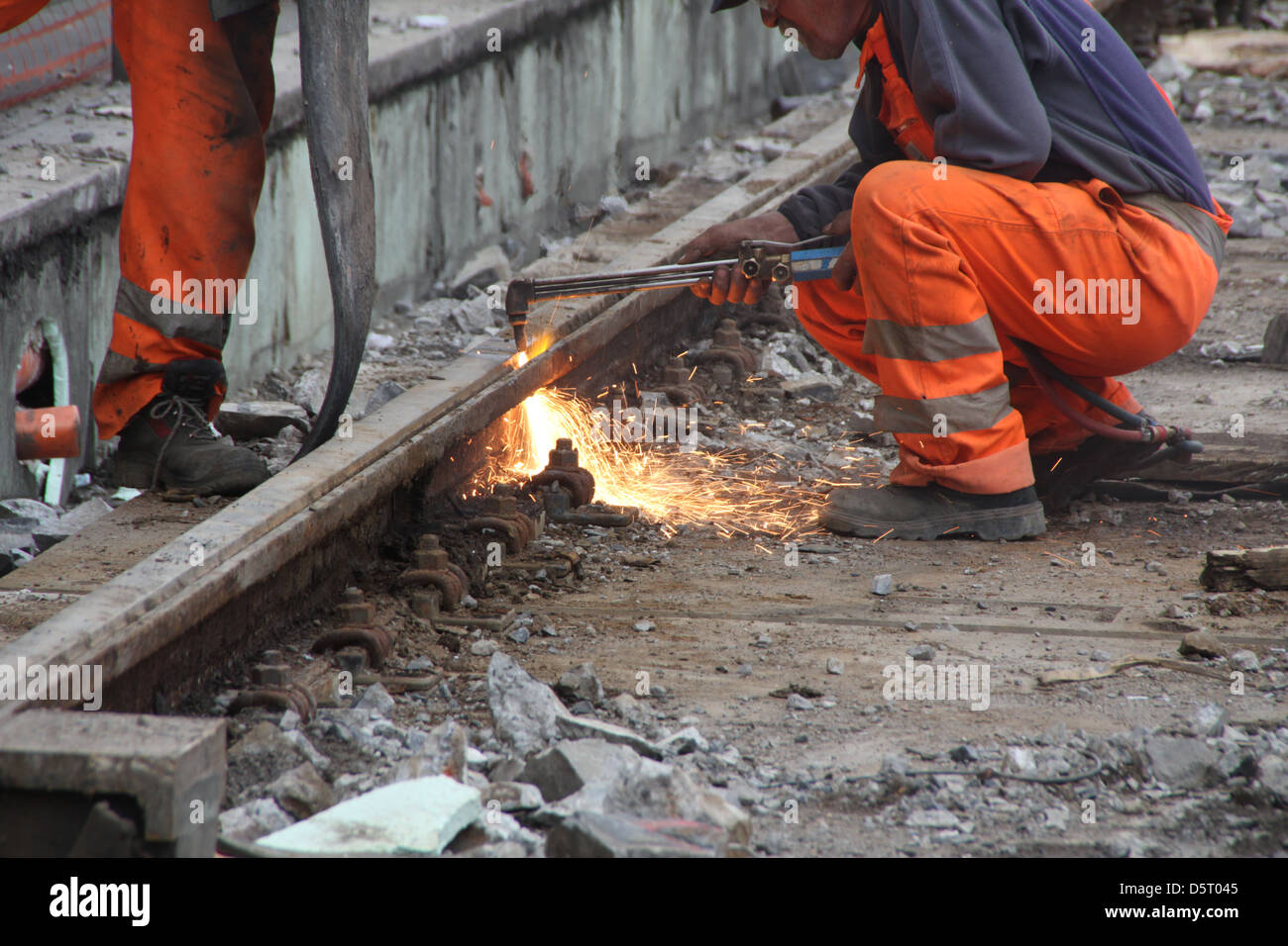 Men cutting sleepers hi-res stock photography and images - Alamy