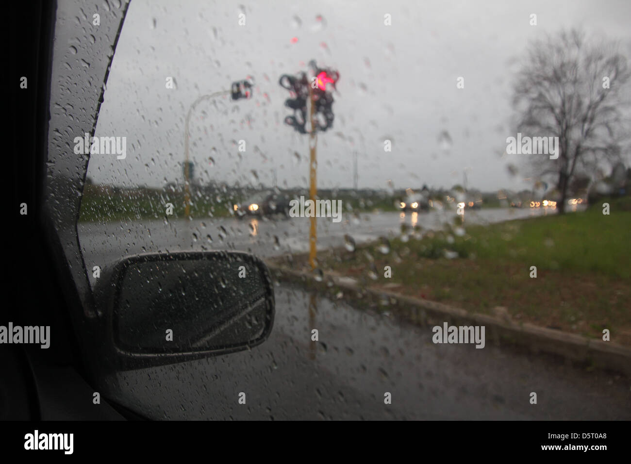 car lights in rain at night Stock Photo - Alamy