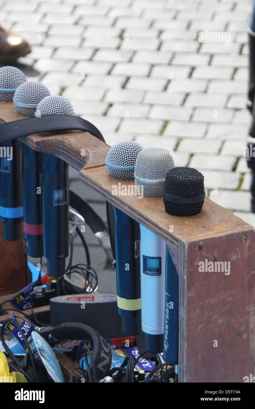 set of microphones on a stand at event Stock Photo - Alamy