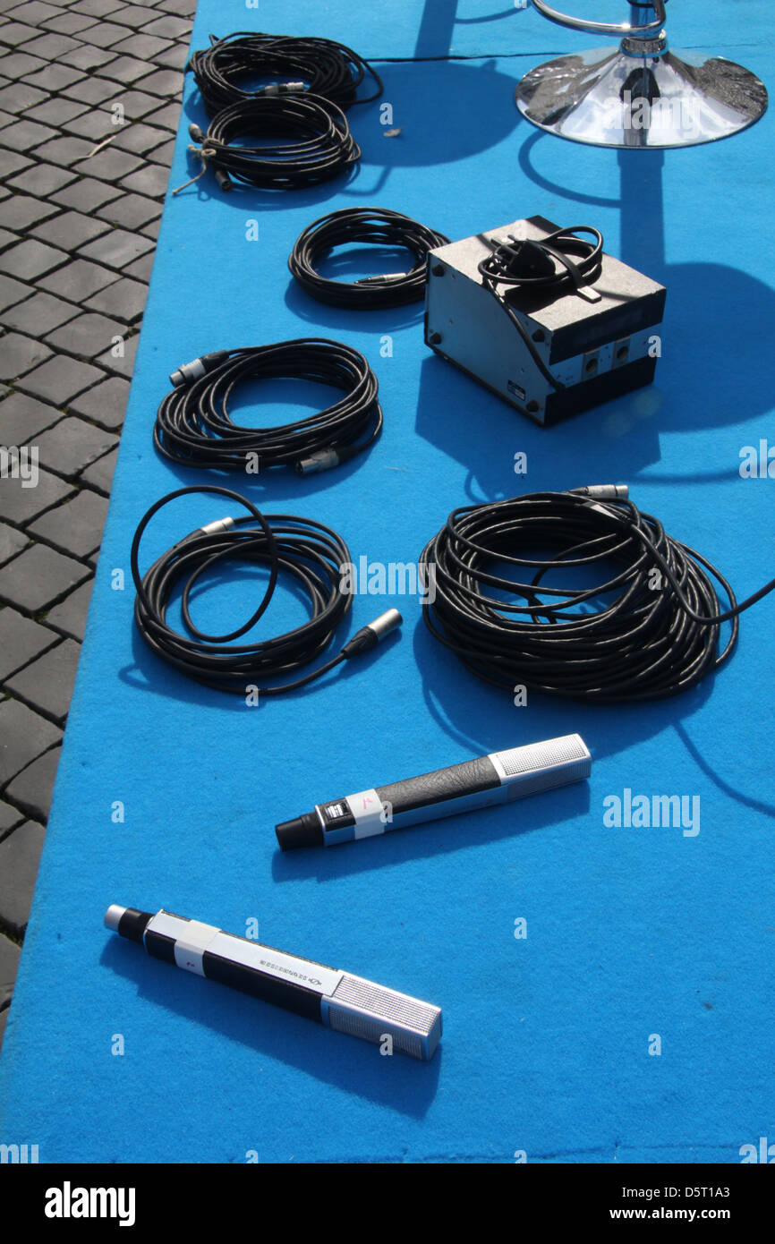set of microphones on a stand at event Stock Photo - Alamy