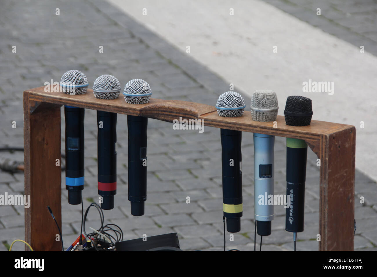 set of microphones on a stand at event Stock Photo - Alamy