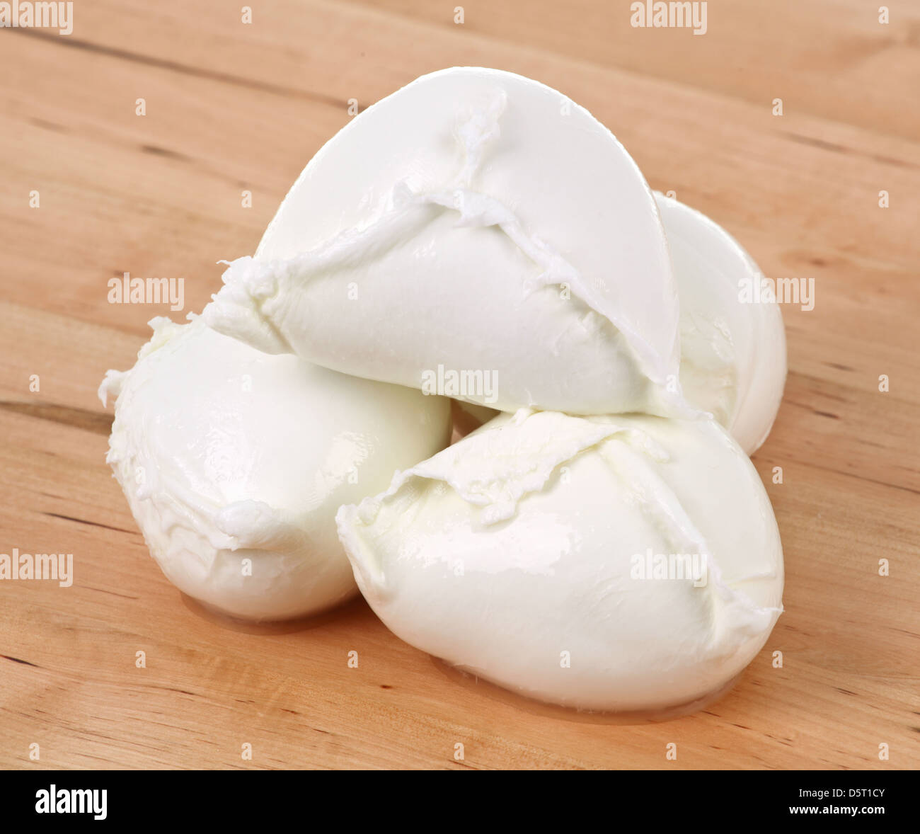 Fresh italian mozzarella on wood table Stock Photo - Alamy