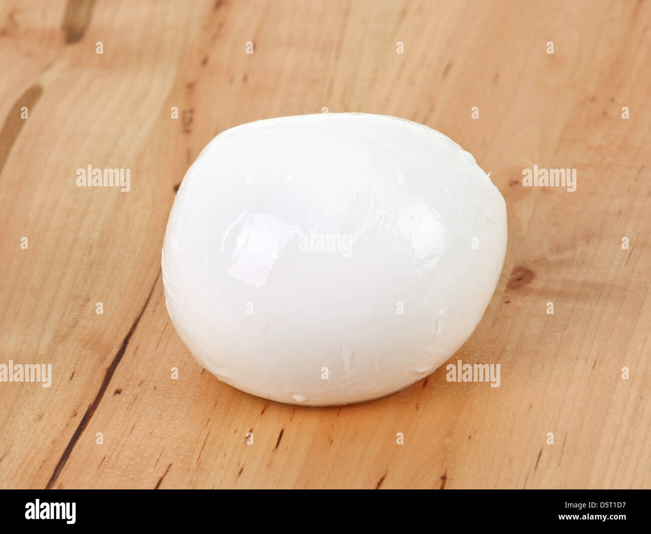Fresh italian mozzarella on wood table Stock Photo - Alamy