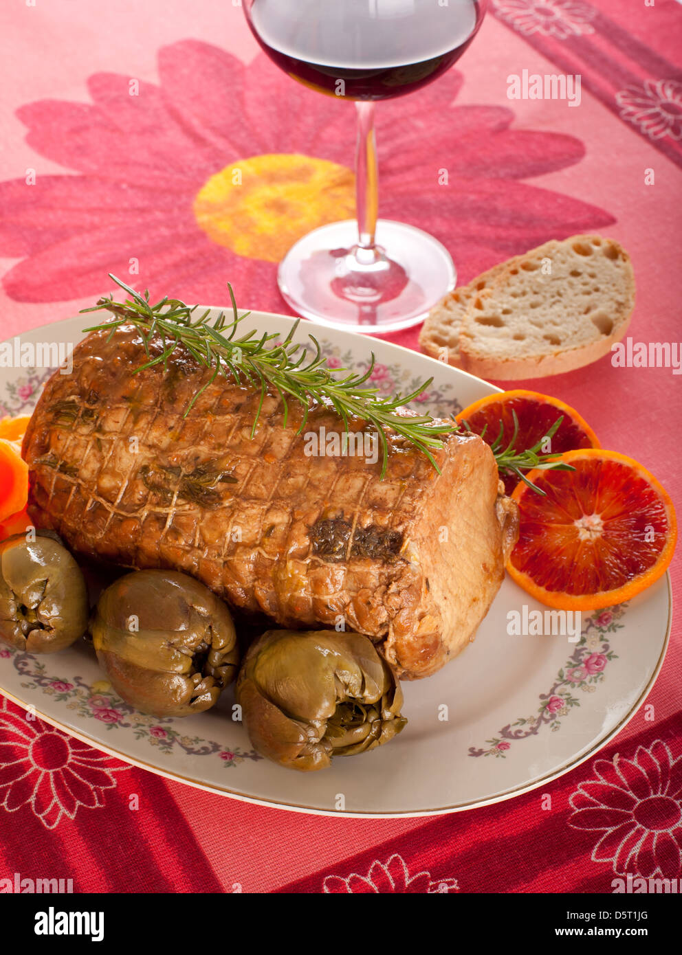 Roulade of pork on white background Stock Photo - Alamy