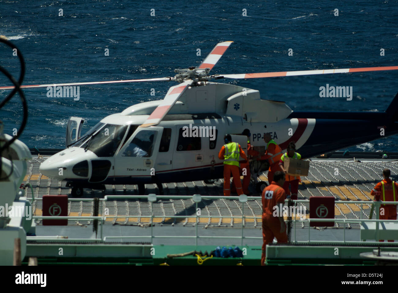 Helicopter landed in the deck of the seismic vessel Veritas Vantage for ...