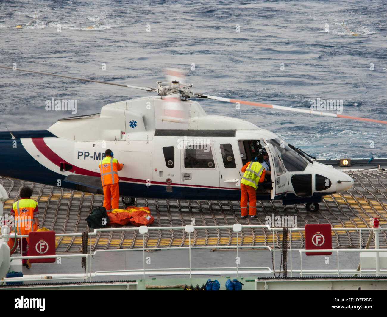 Helicopter landed in the deck of the seismic vessel Veritas Vantage for ...
