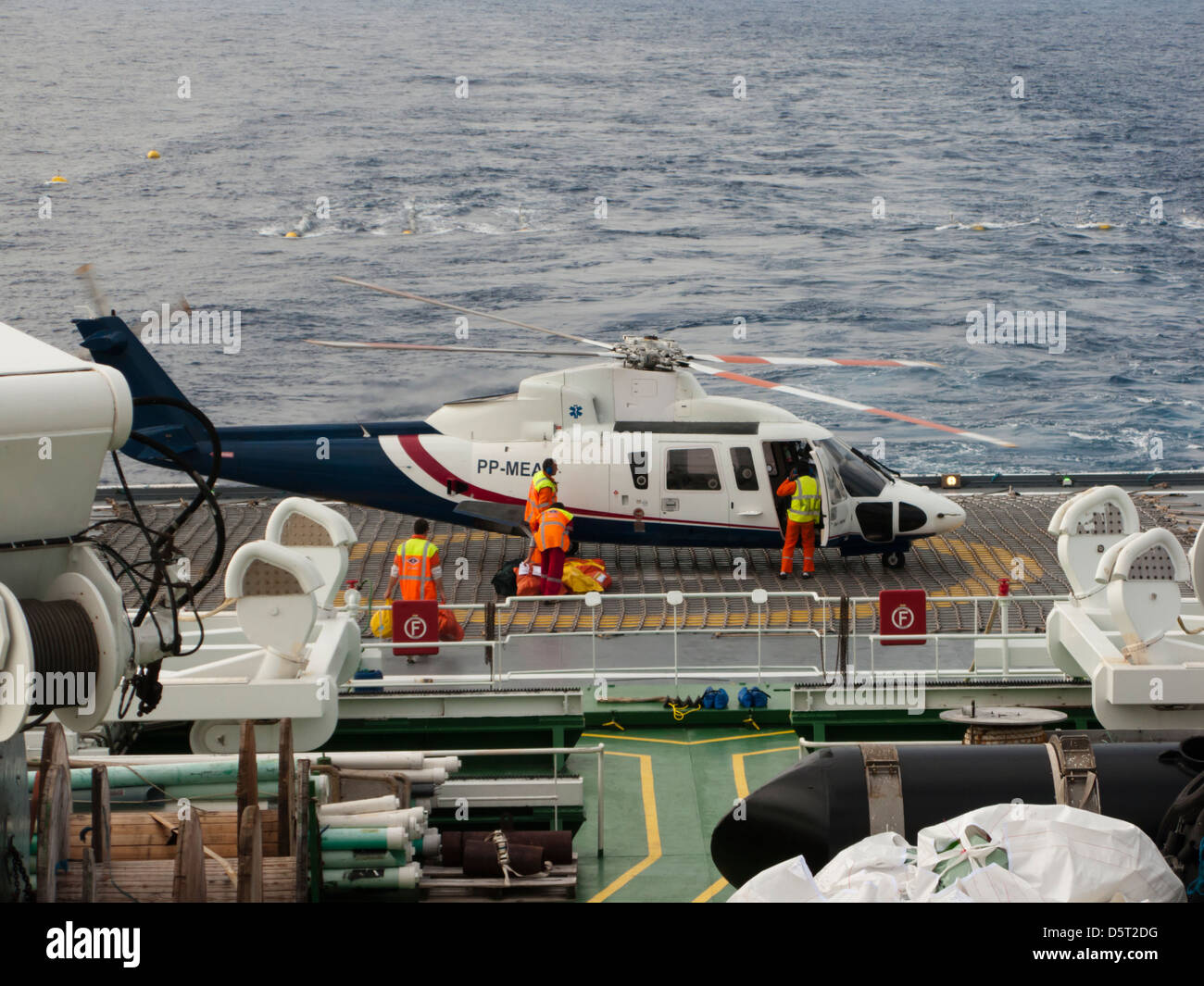 Helicopter landed in the deck of the seismic vessel Veritas Vantage for ...