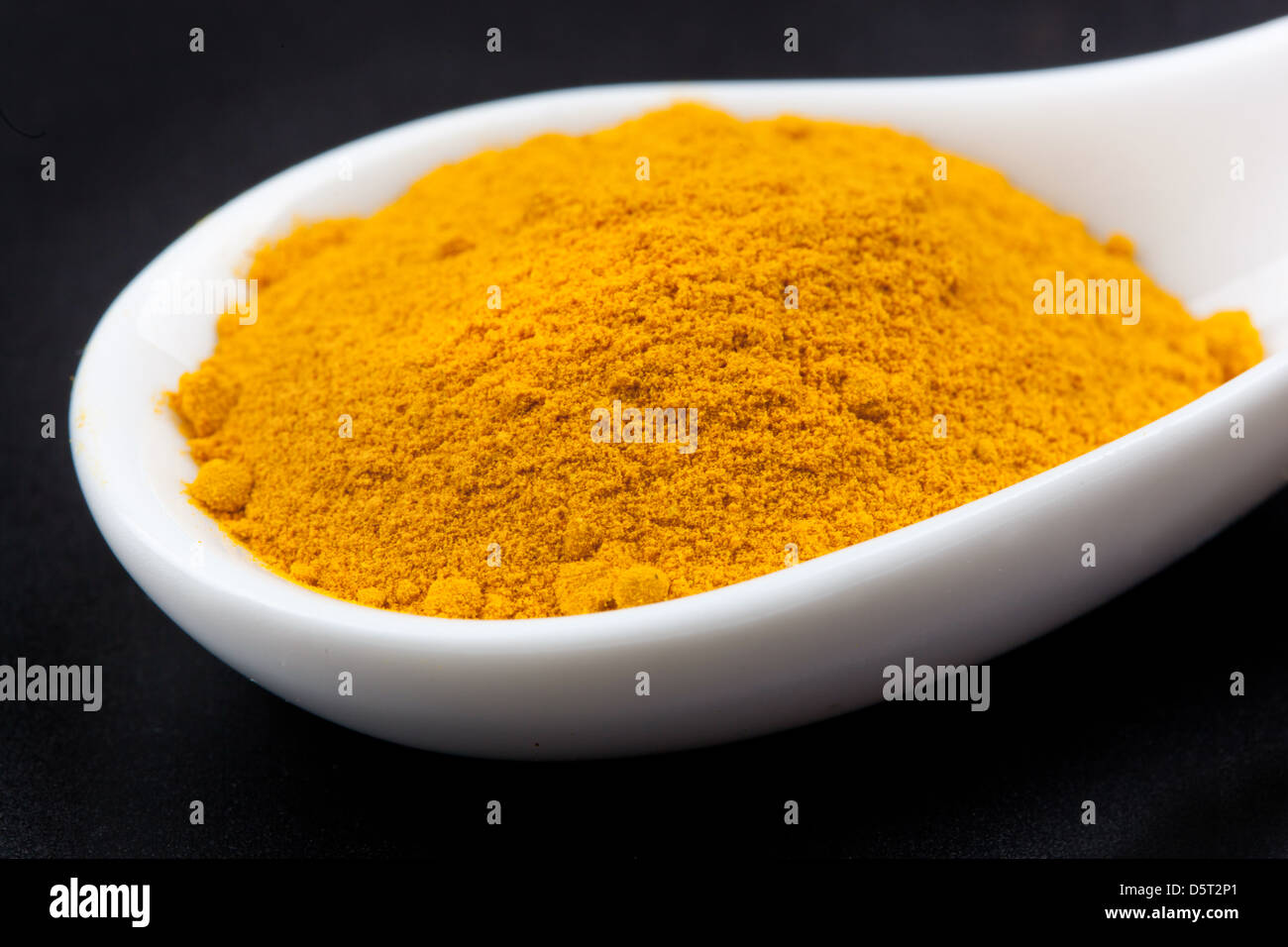 Turmeric powder hi-res stock photography and images - Alamy
