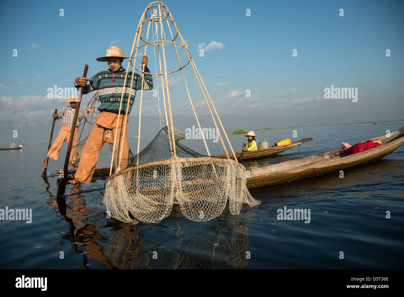 The fishermen come out early in the morning to catch fish with carp ...