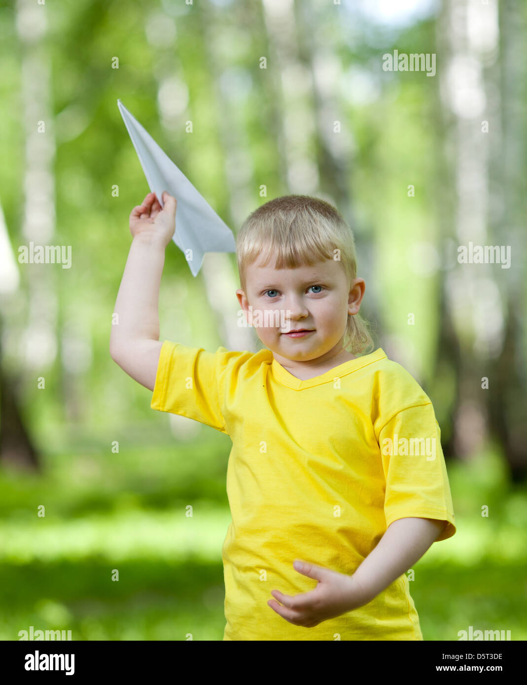 Children playing and flying a paper airplane Stock Photo - Alamy