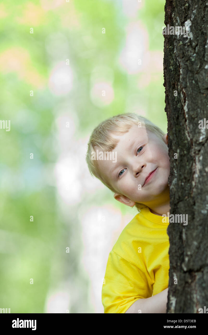 kid playing on the park tree outdoor Stock Photo - Alamy