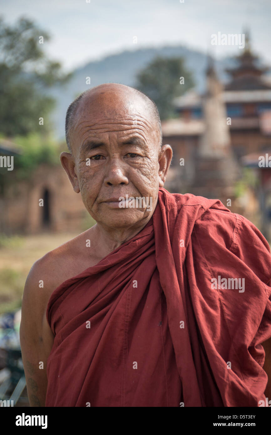 Monk at ancient monastery on Inle Lake Stock Photo - Alamy