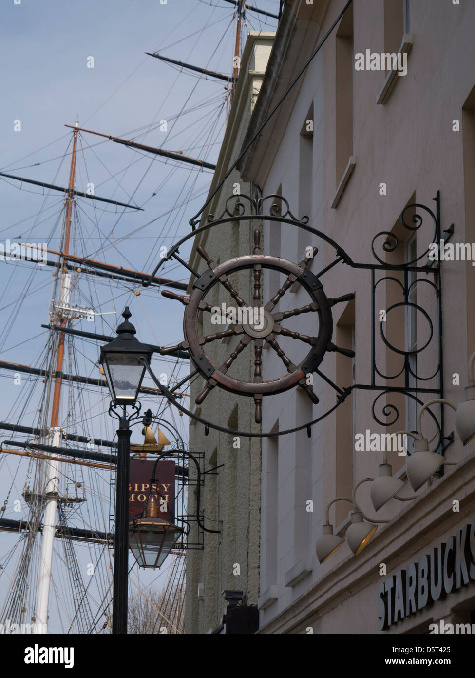 LONDON, UK - APRIL 07, 2013: Ships Wheel sign above shop in Maritime ...