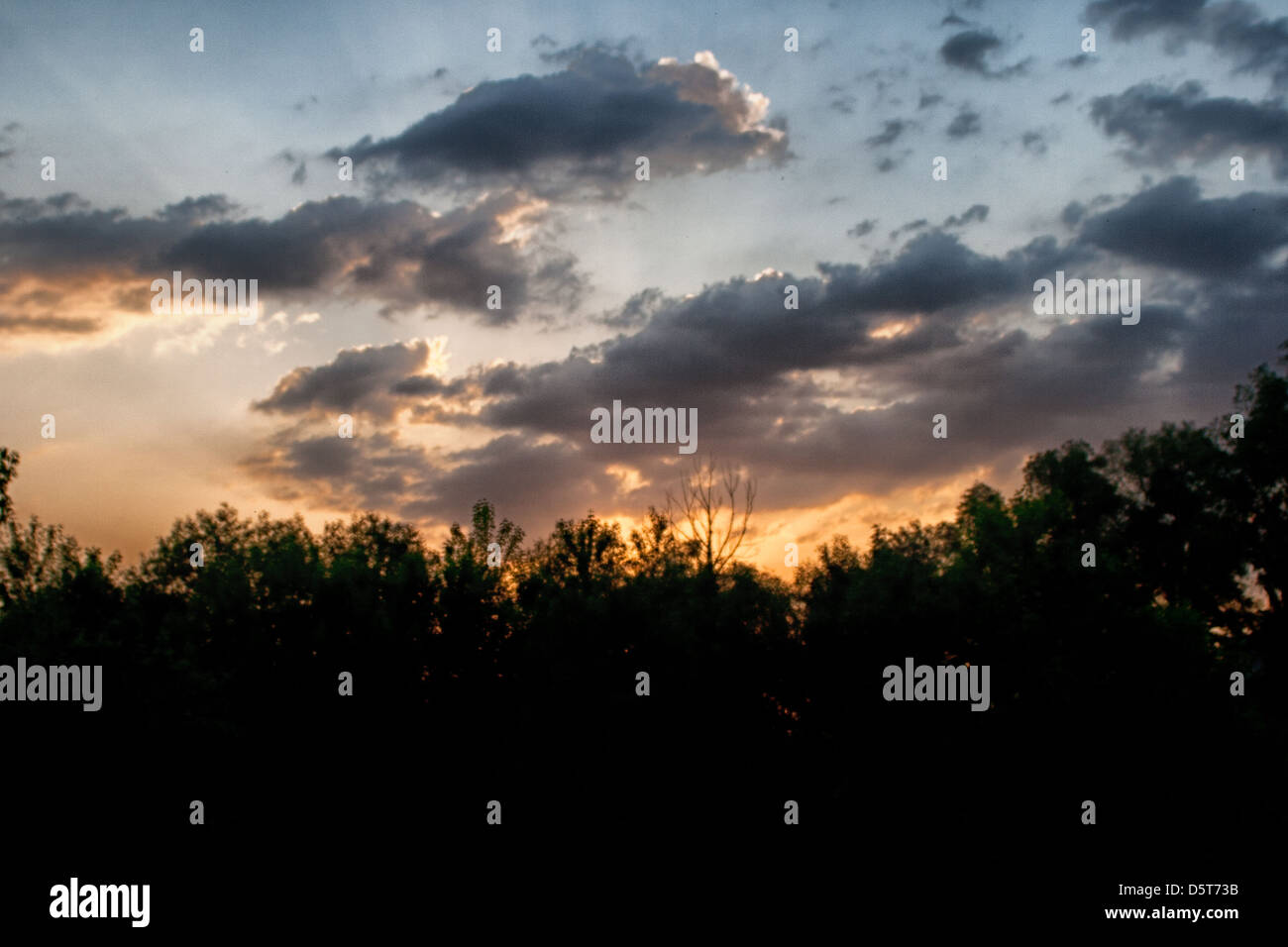 beautiful sunset with blue sky and clouds Stock Photo - Alamy