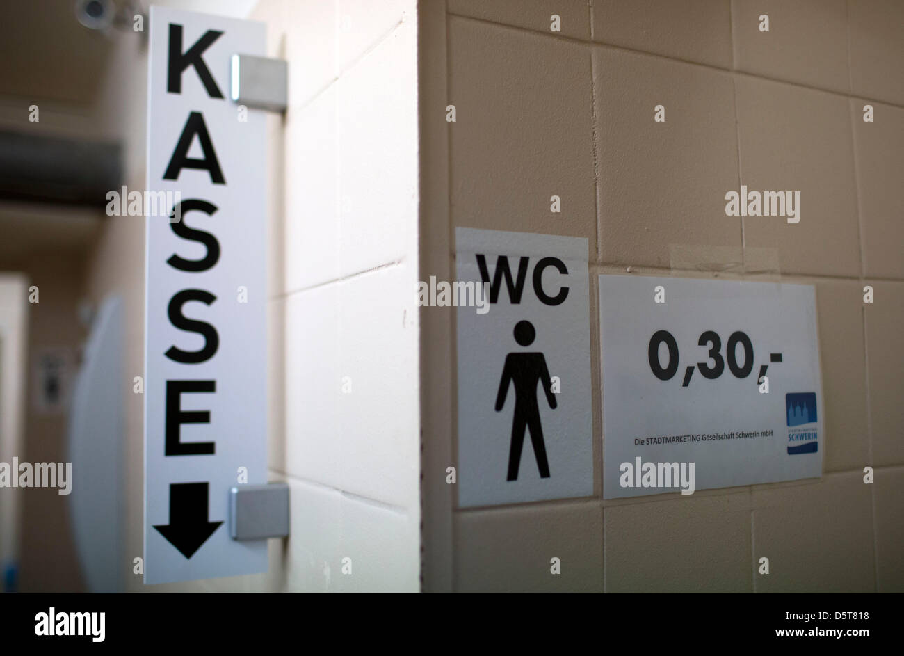 A sign for a public toilet is pictured on the Schlachtermarkt in ...