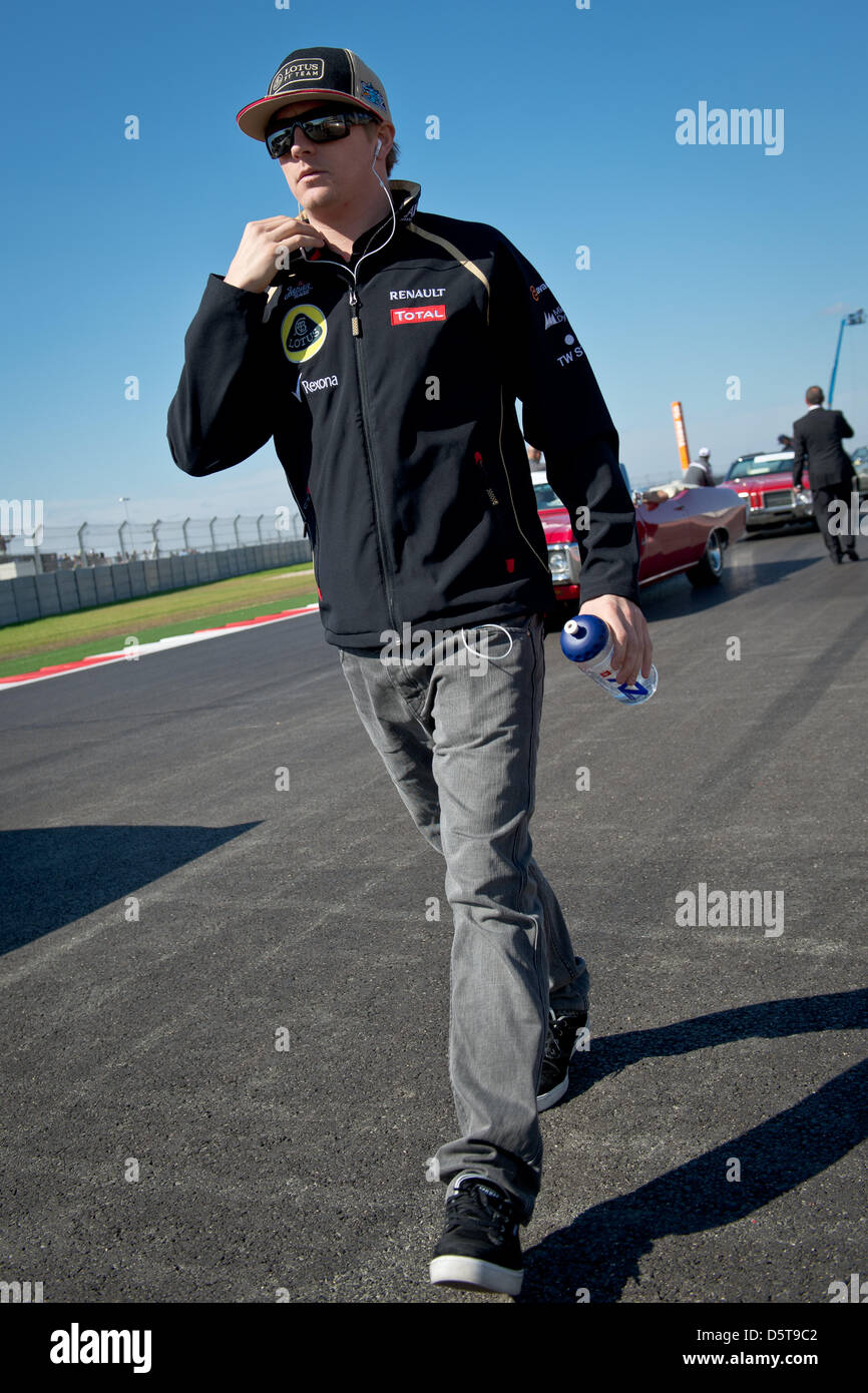 Finnish Formula One driver Kimi Raikkonen of Lotus returns from the ...