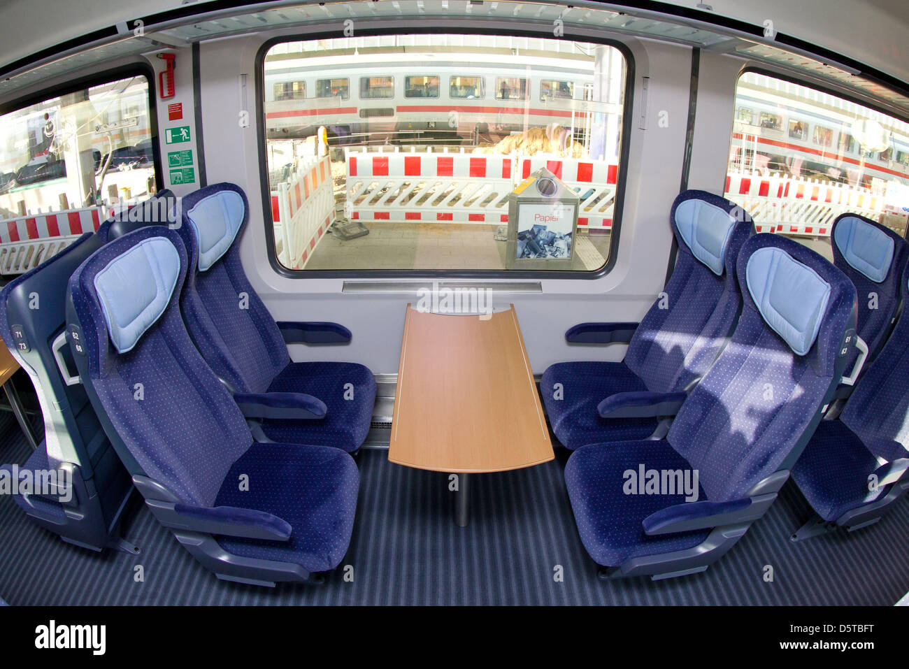 Rows of second class seats are pictured in a modernized Intercity wagon ...