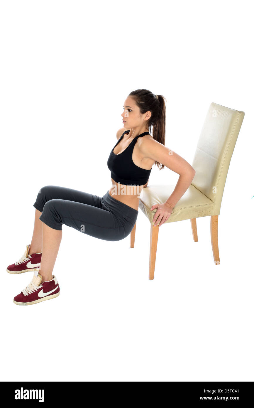 Confident Determined Young Woman Performing Tricep Dips Exercises Using ...