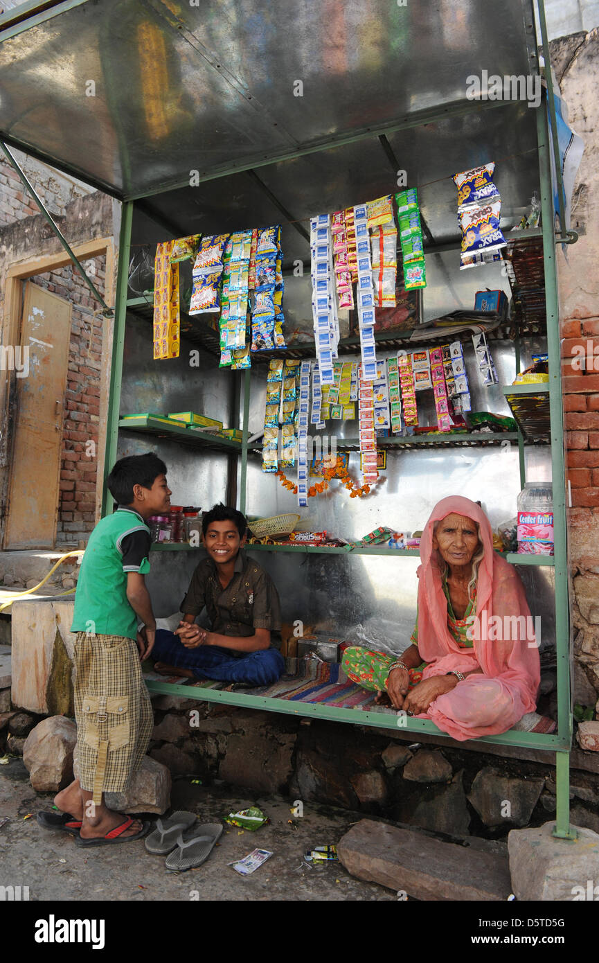 76-year-old Suraj Devi sits in her market stall in a poor area of ...