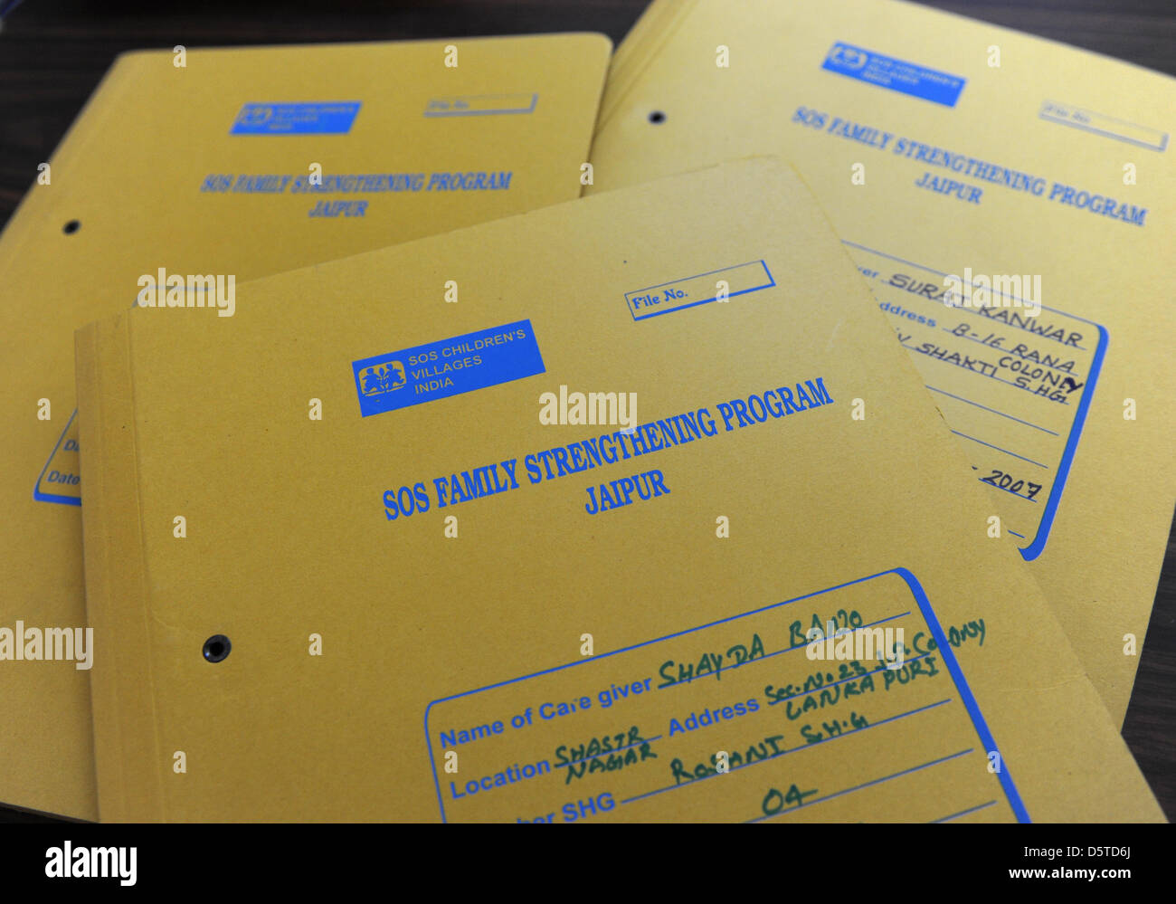 Folders, documenting the cases in which support was given to families ...