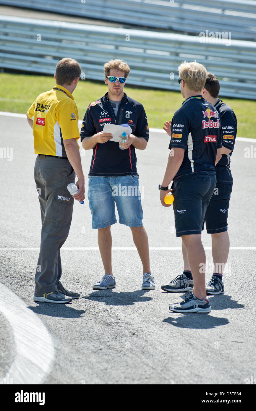 German Formula One driver Sebastian Vettel of Red Bull (2nd L-R), his ...