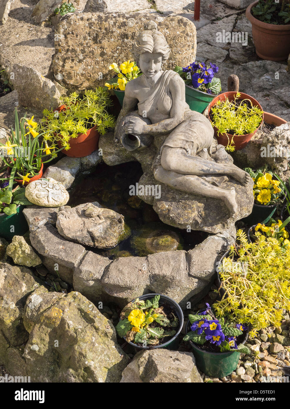Ornamental Garden Pond, Stone Statue, Devon, England, UK. Europe Stock ...
