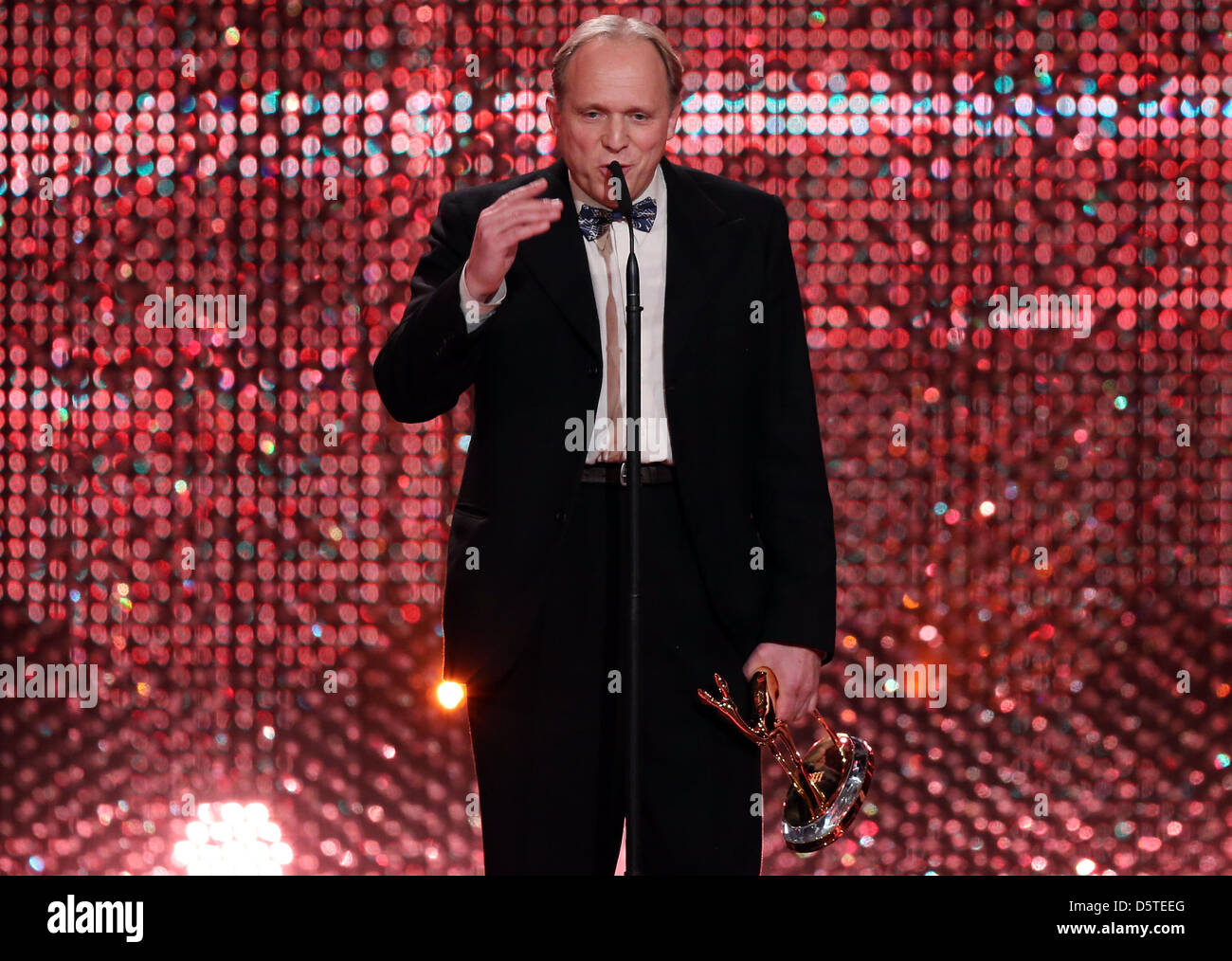 Actor Ulrich Tukur on stage with the Bambi Trophy in the category Actor ...