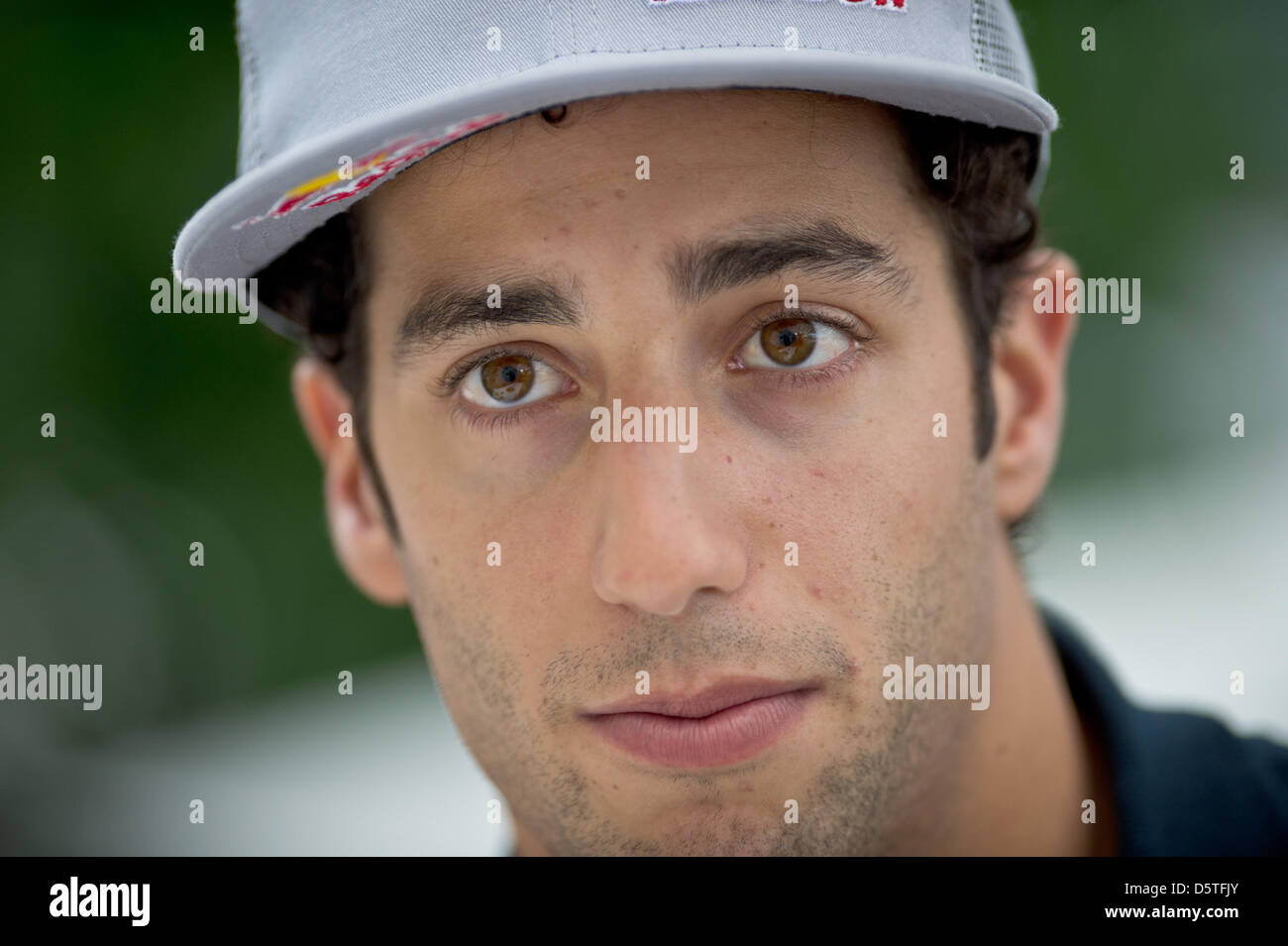 Australian Formula One driver Daniel Ricciardo of Toro Rosso talks to ...