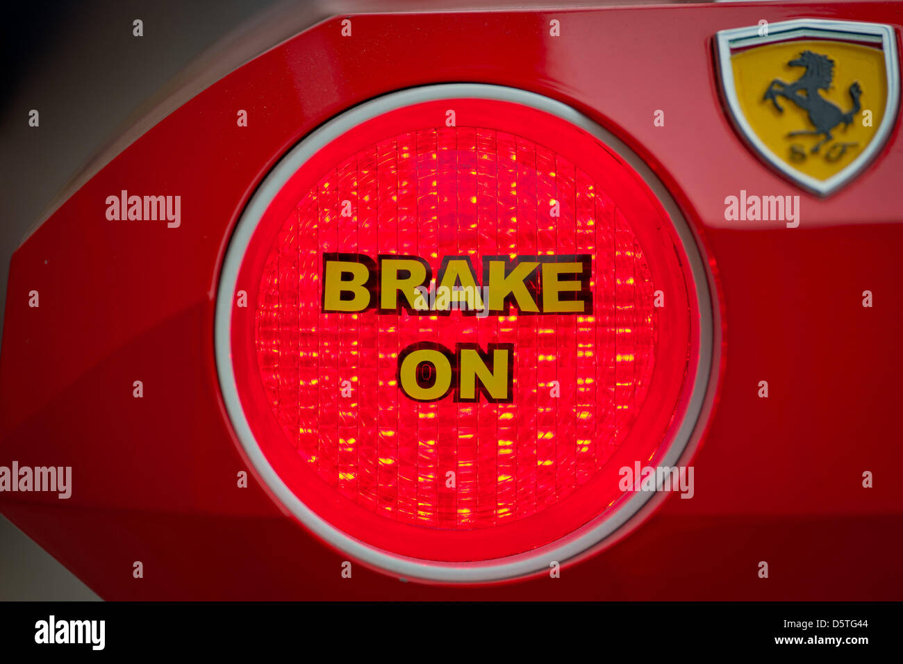 Ferrari pit stop signal lights up red during the third practice session ...