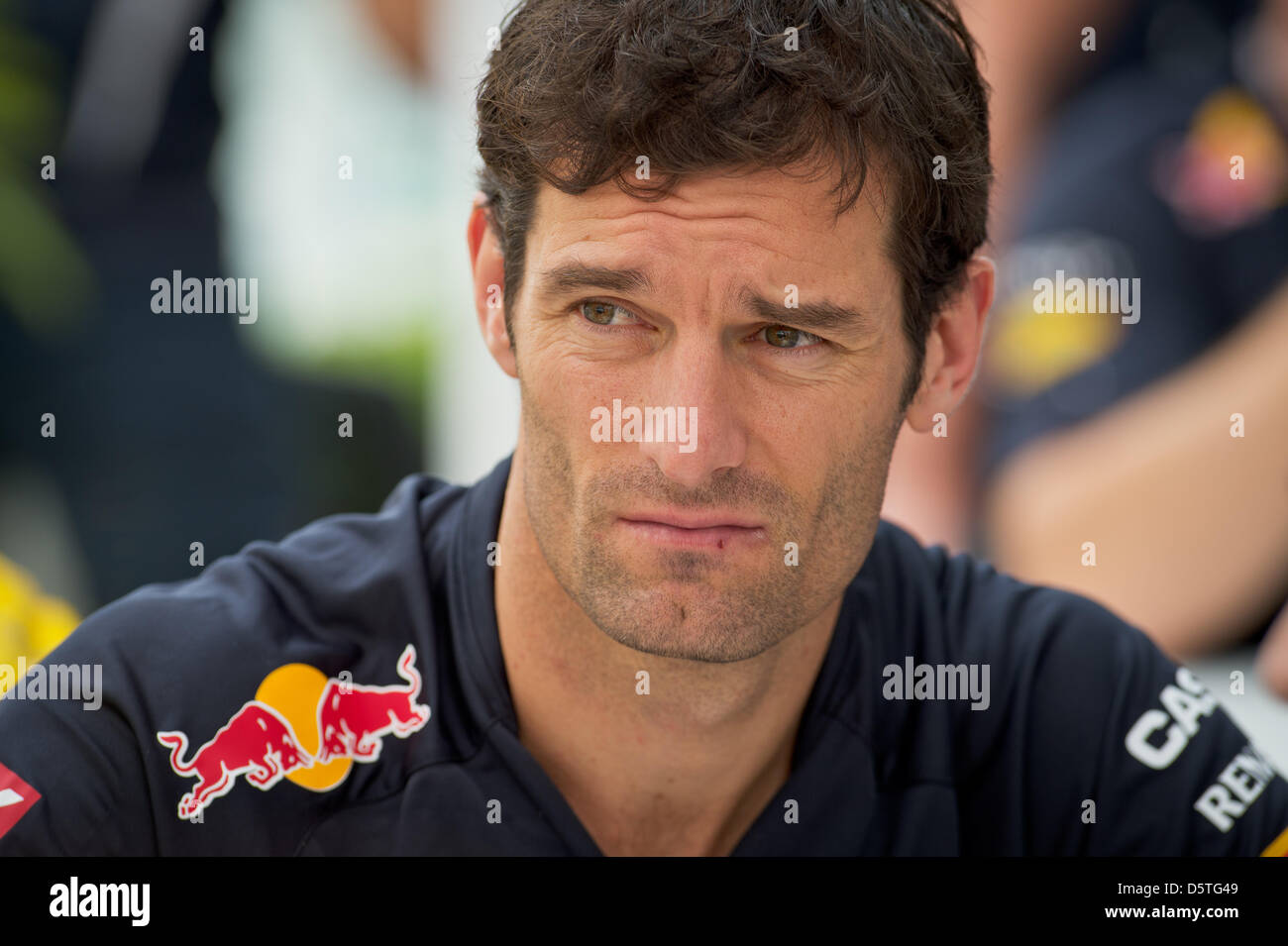 Australian Formula One driver Mark Webber of Red Bull has a chat in the ...