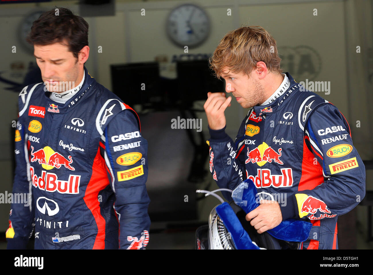 German Formula One driver Sebastian Vettel (R) am his teammate ...