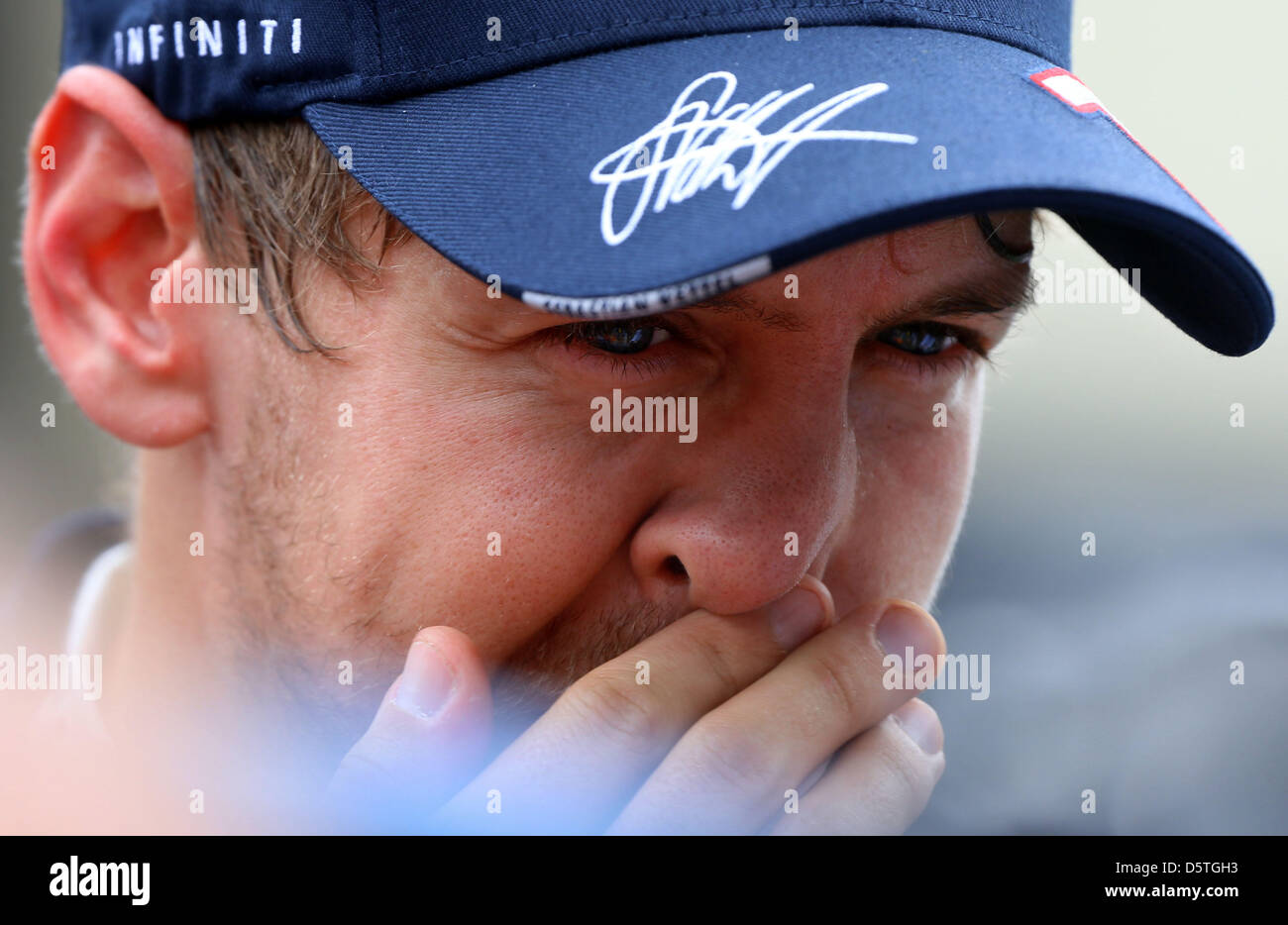 German Formula One driver Sebastian Vettel of Red Bull reacts after the ...
