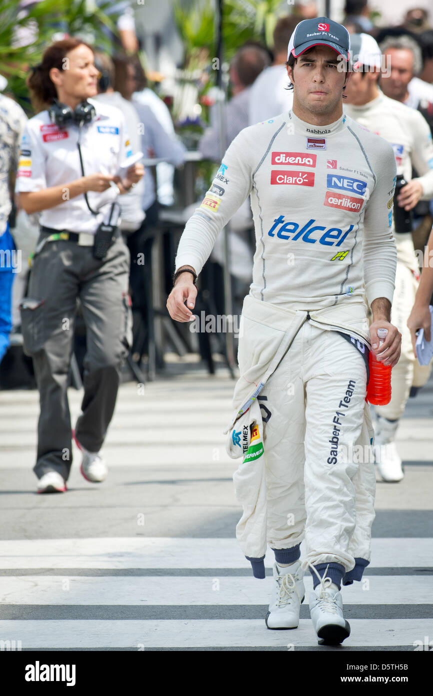 Mexican Formula One driver Sergio Perez of Sauber walks through the ...