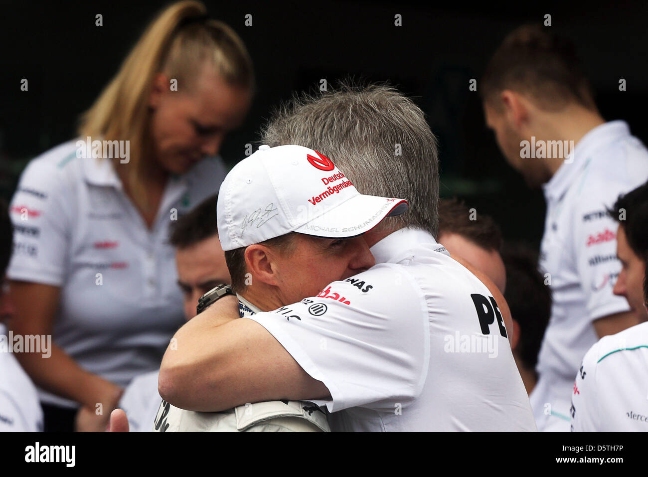 German Formula One driver Michael Schumacher (L) of Mercedes AMG and ...