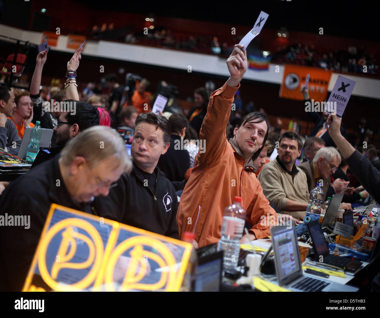 Members of the German Pirate Party (Piraten) vote on a resolution ...
