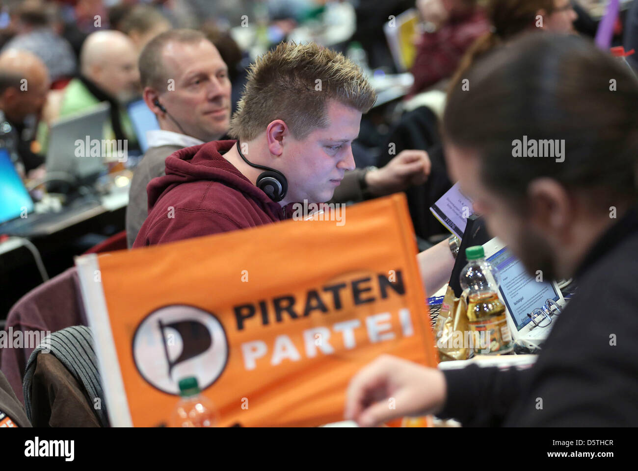 Numerous members of the German Pirate Party (Piraten) use their laptop ...