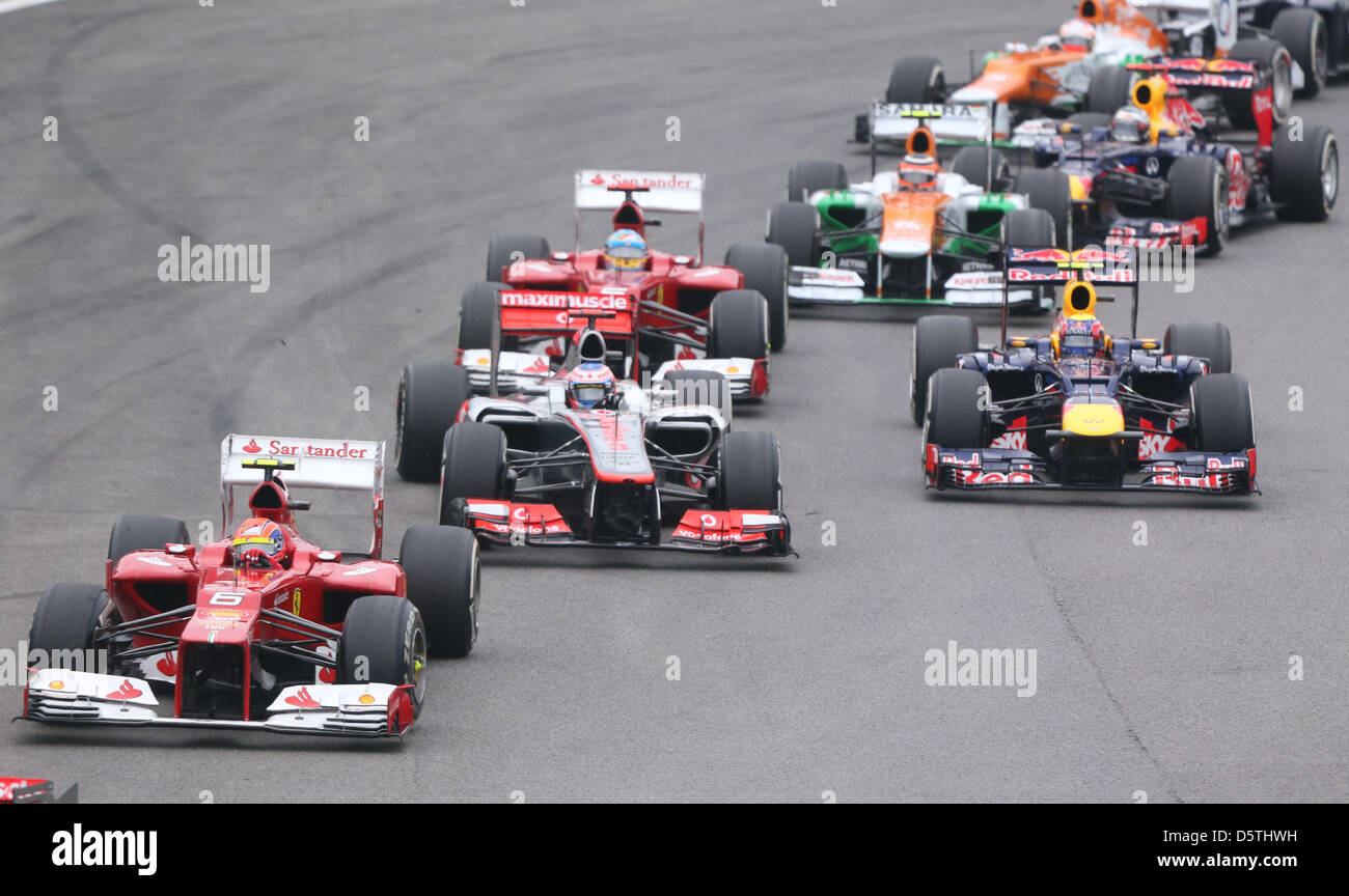 Brazilian pilot Felipe Massa of the Ferrari steers his car ahead of ...
