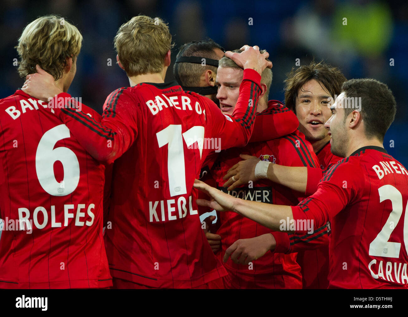Leverkusen's Lars Bender (C) celebrates his 0:1 with some of his ...